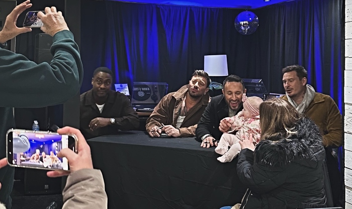 Hundreds queue at Nantwich music store to meet boy band Blue